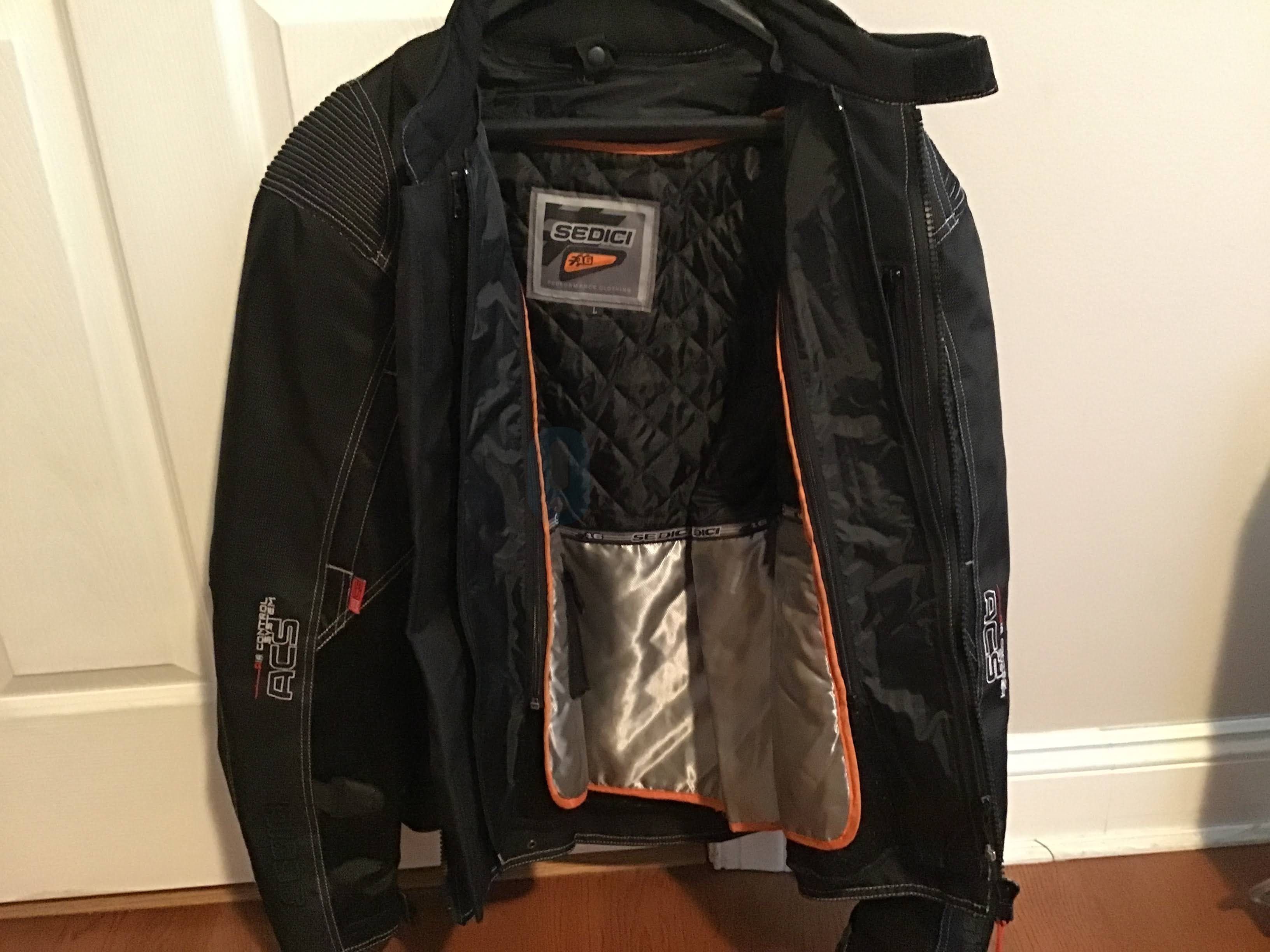 LIKE NEW ALL-SEASON MOTORCYCLE JACKET WITH FULL GUARD PROTECTION