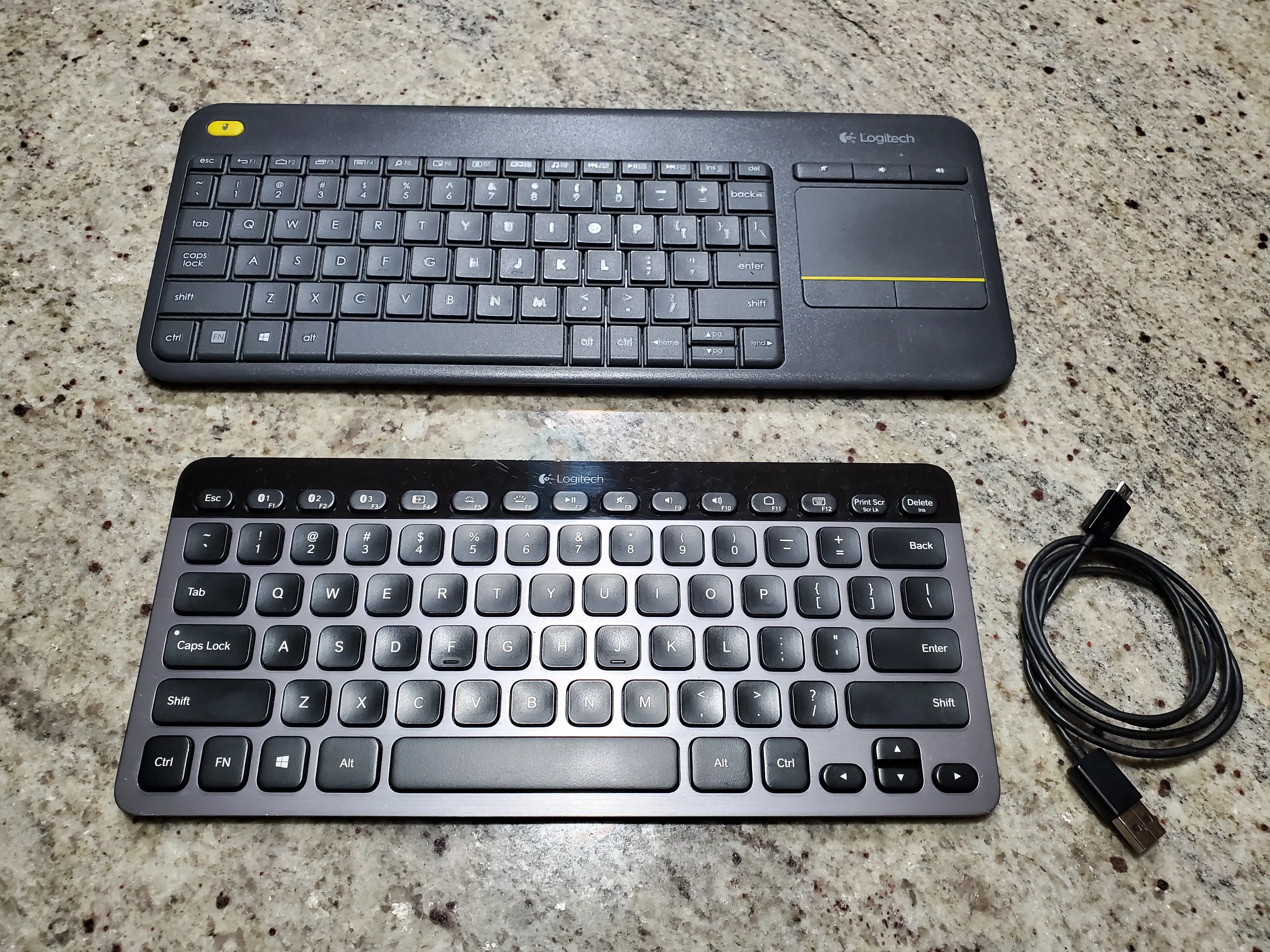2× Logitech wireless keyboards