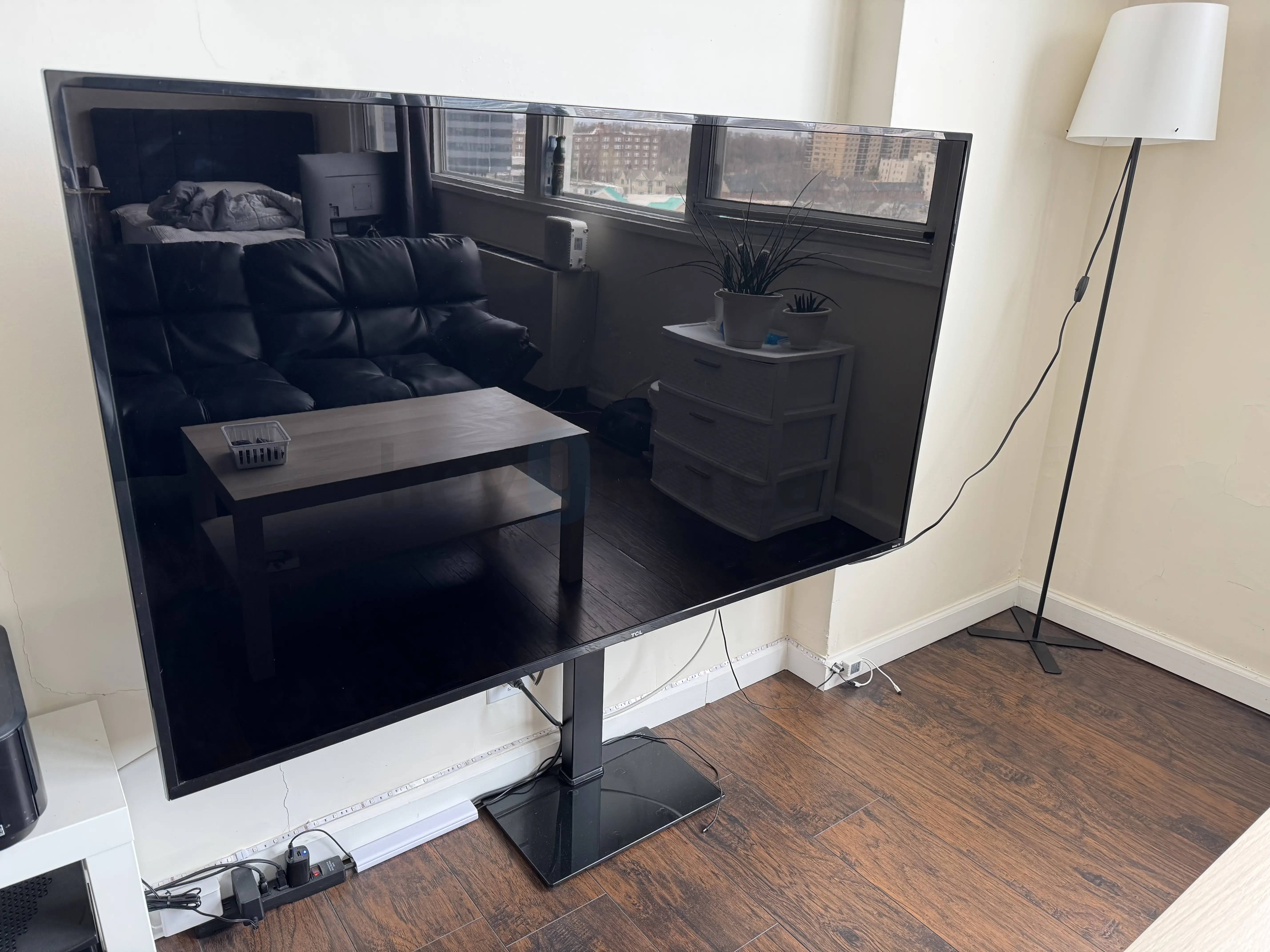 TCL 4K 65-inch Roku Smart TV + TV Stand